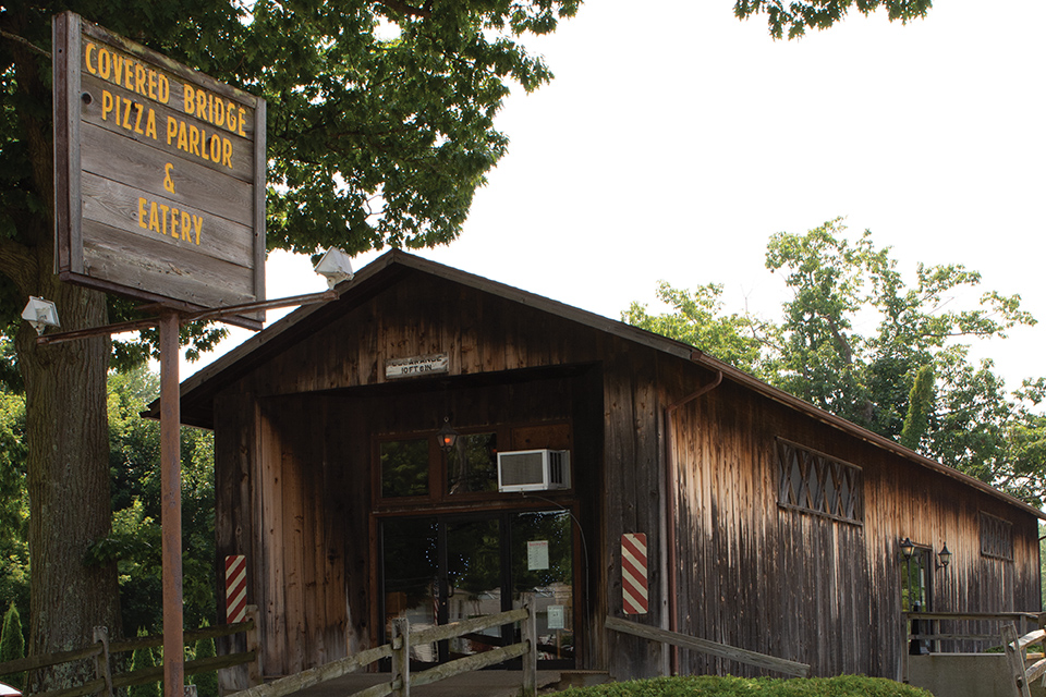 Eat at This Pizza Parlor Inside a Covered Bridge